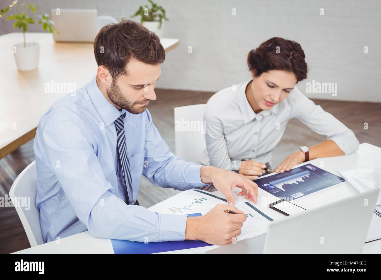 Executives working desk in office hi-res stock photography and images ...