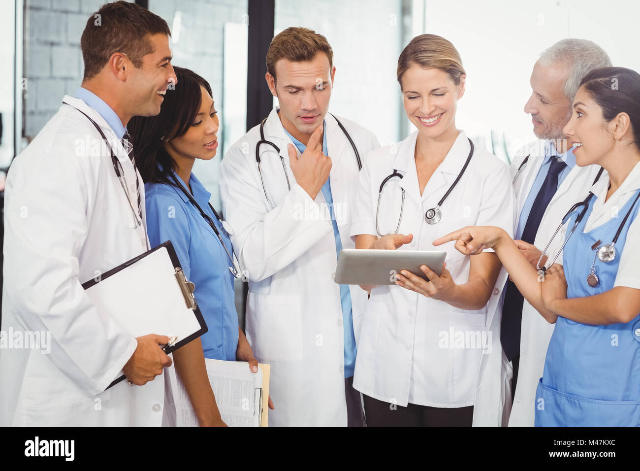 Female caucasian team leader tablet hi-res stock photography and images ...