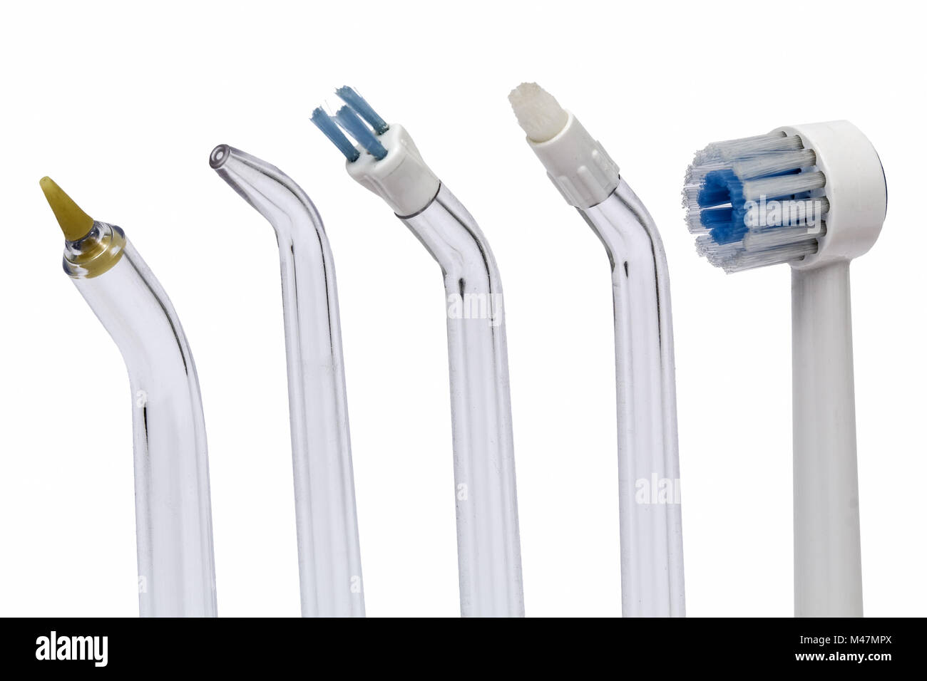 Tools for dental cleaning, isolated on white background Stock Photo - Alamy