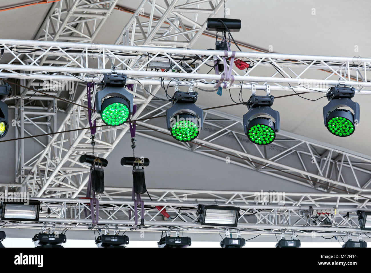 spotlights on stage before concert Stock Photo - Alamy