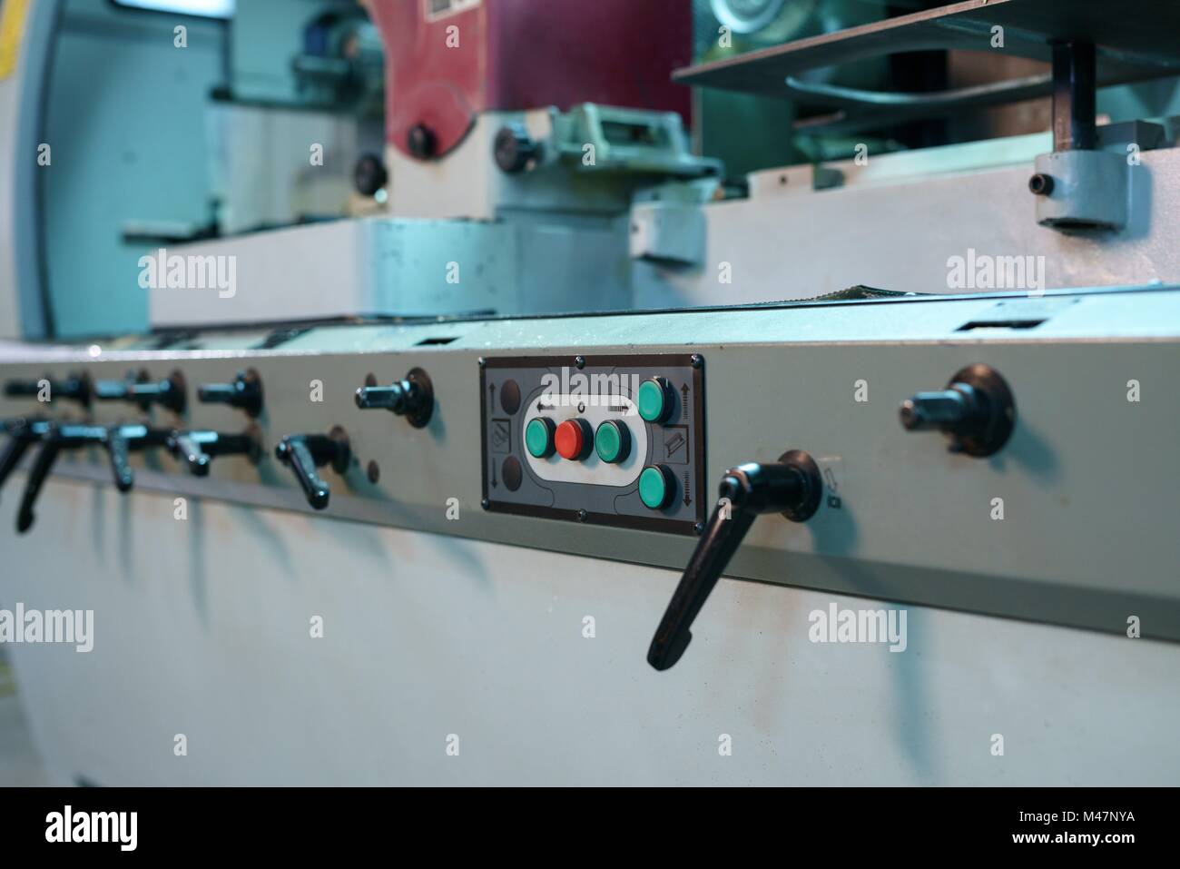 Control panel with buttons and levers on machine Stock Photo - Alamy