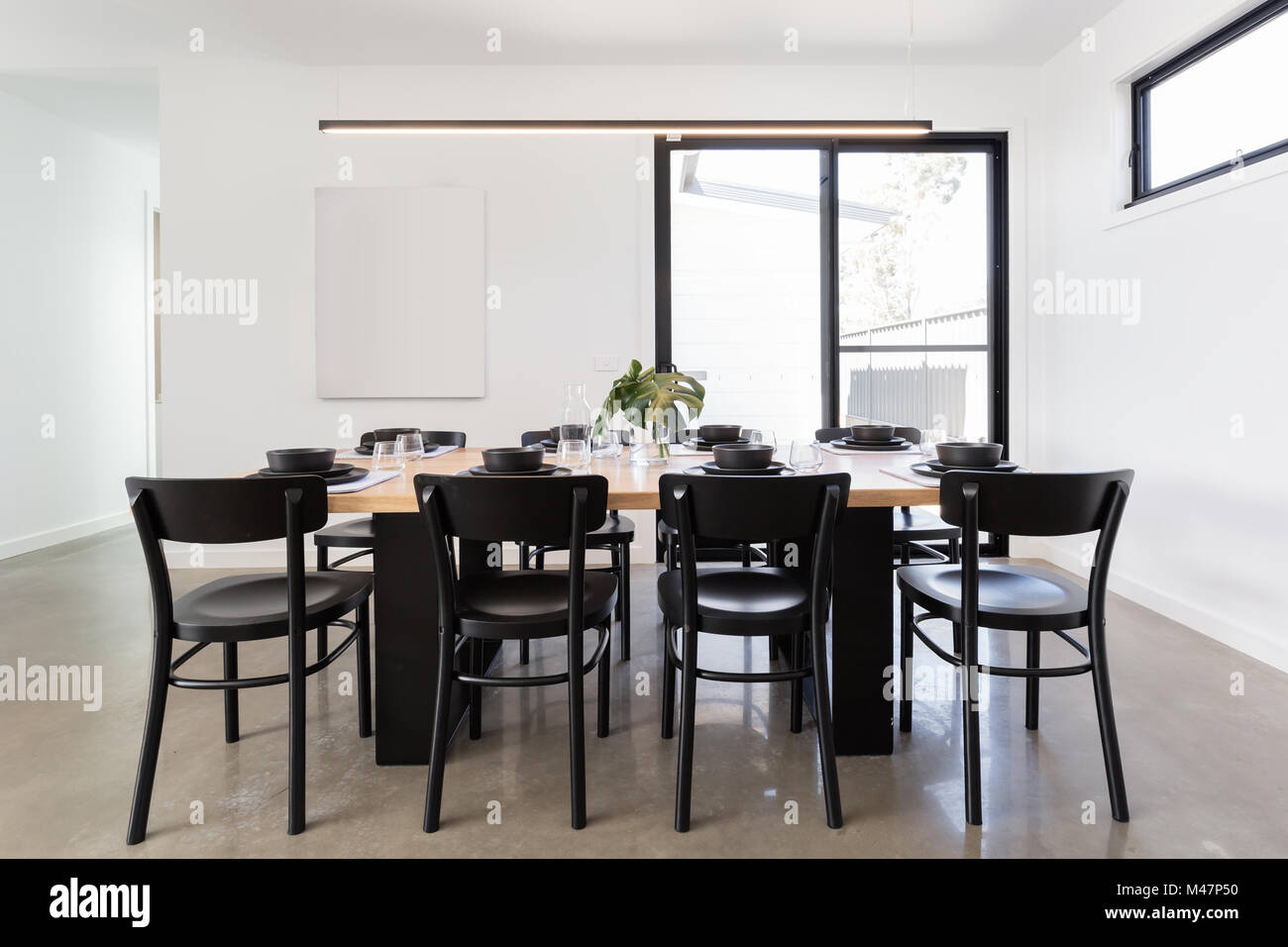 Dining table set for lunch in a contemporary home Stock Photo - Alamy