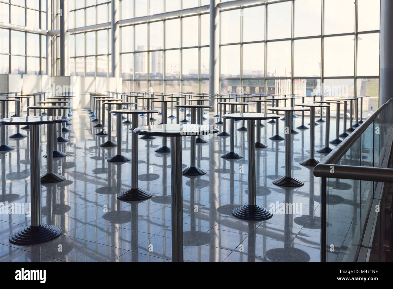 interior cafe indoor group table large bright windows Stock Photo - Alamy