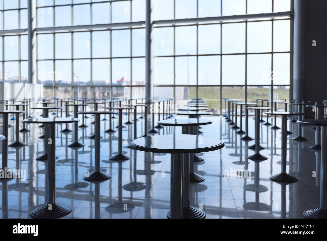 interior cafe indoor group table large bright windows Stock Photo - Alamy