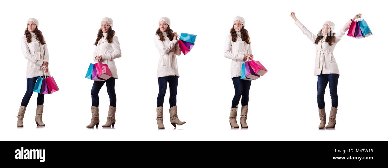 Woman in winter clothing doing christmas shopping Stock Photo - Alamy