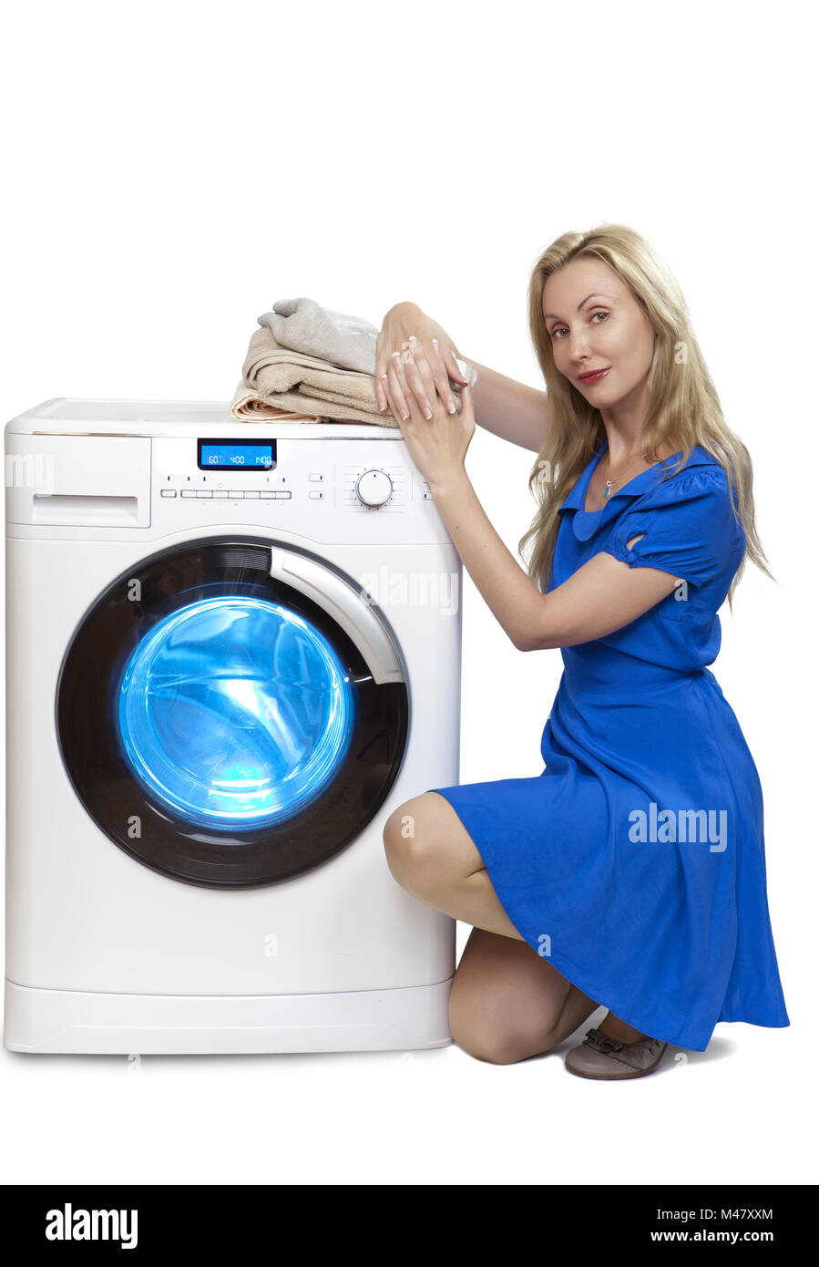 The happy young woman near the new washing machine Stock Photo - Alamy