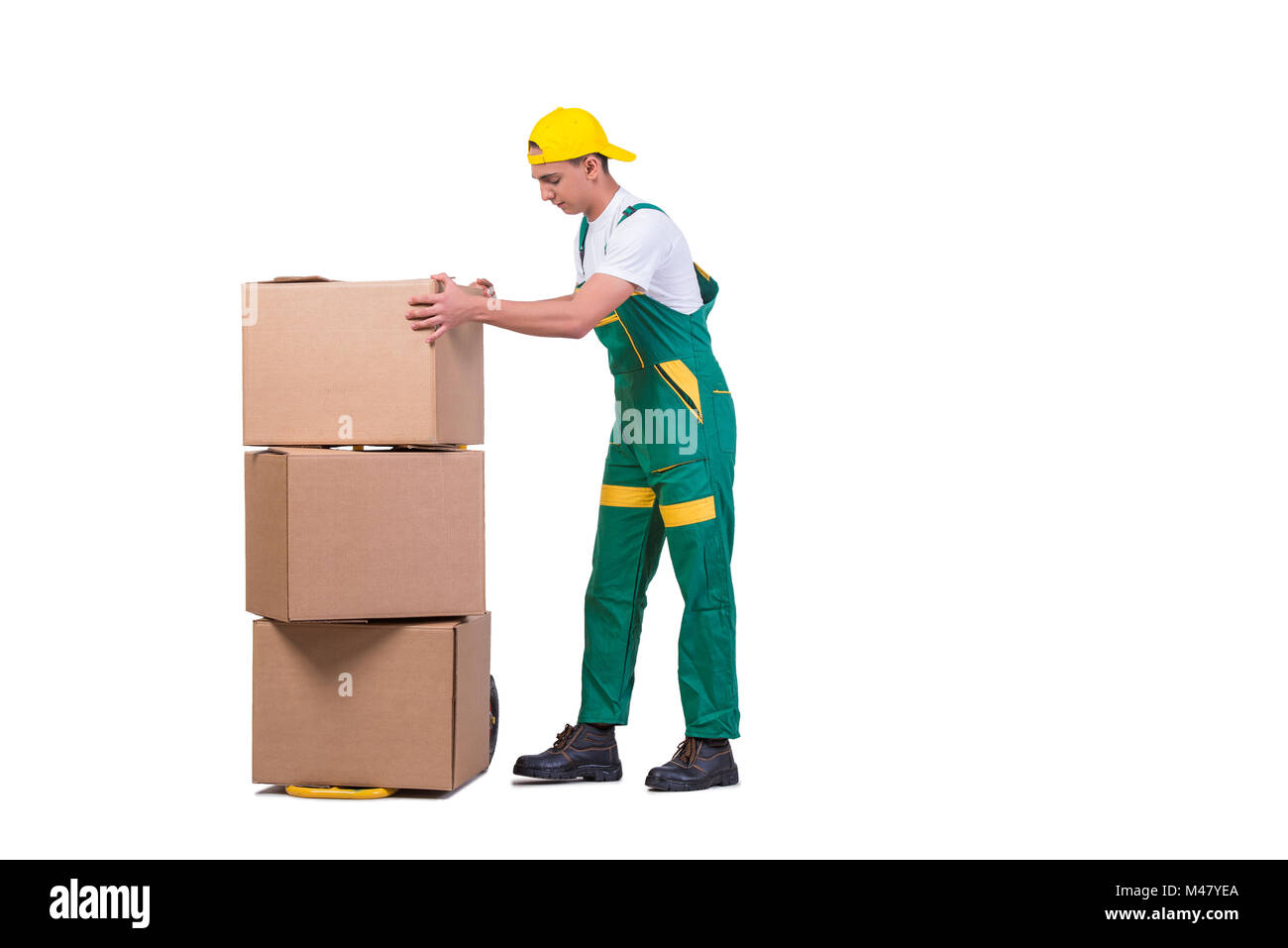 Young man moving boxes with cart isolated on white Stock Photo - Alamy