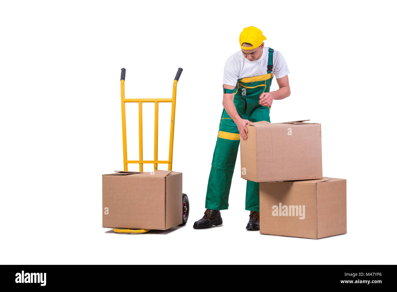 Young man moving boxes with cart isolated on white Stock Photo - Alamy