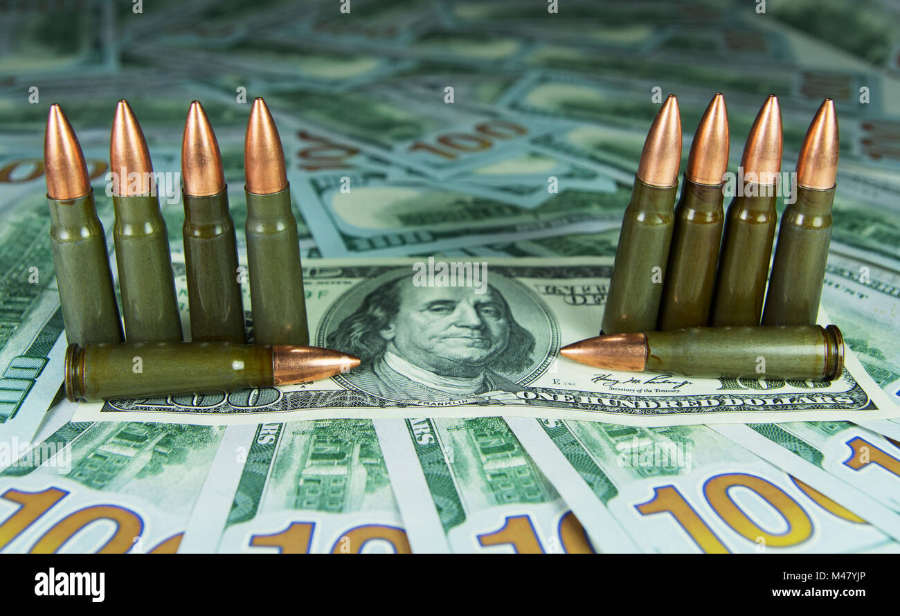 Money and bullet hi-res stock photography and images - Alamy