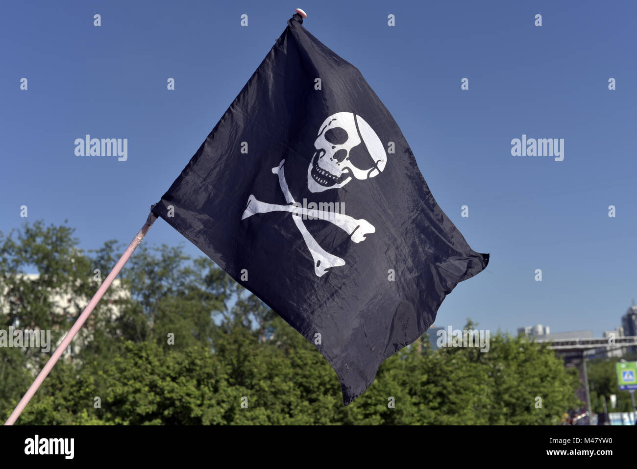 Pirate flag flying in the festival of youth culture Stock Photo - Alamy