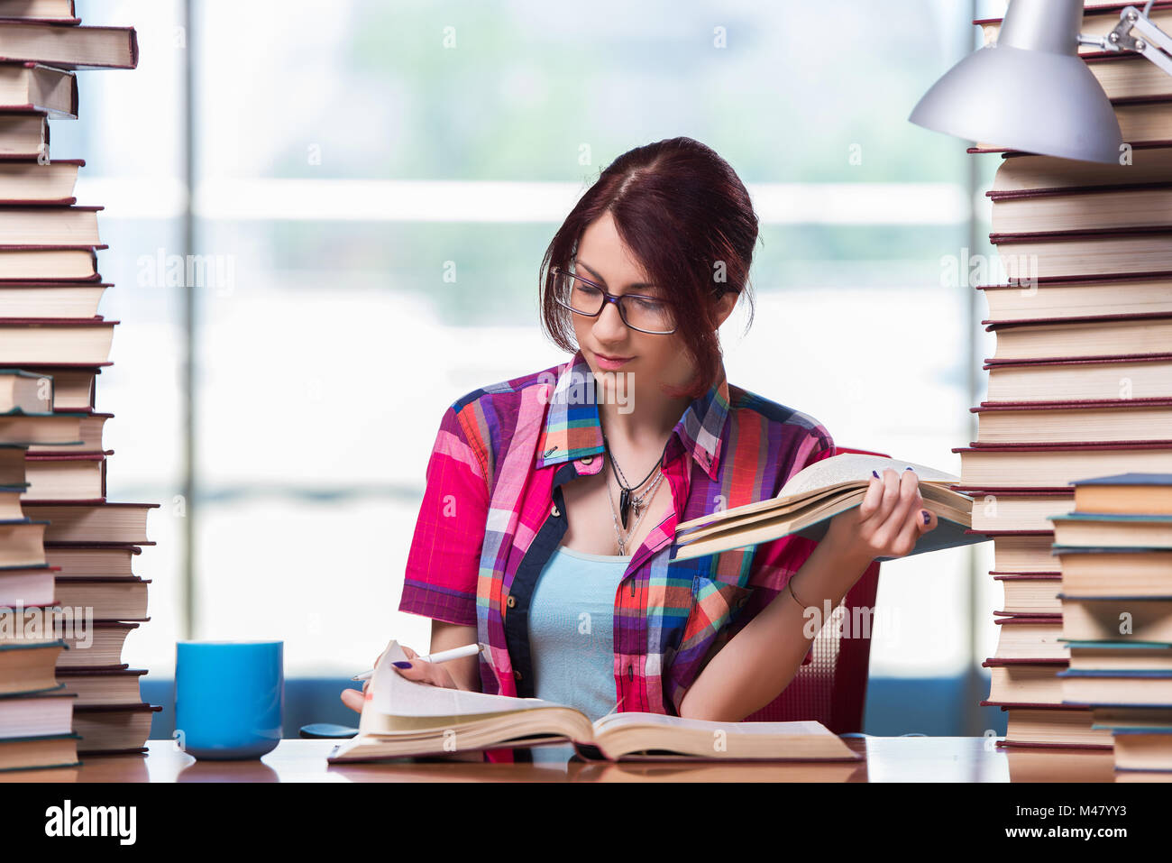 Young woman student preparing for college exams Stock Photo - Alamy
