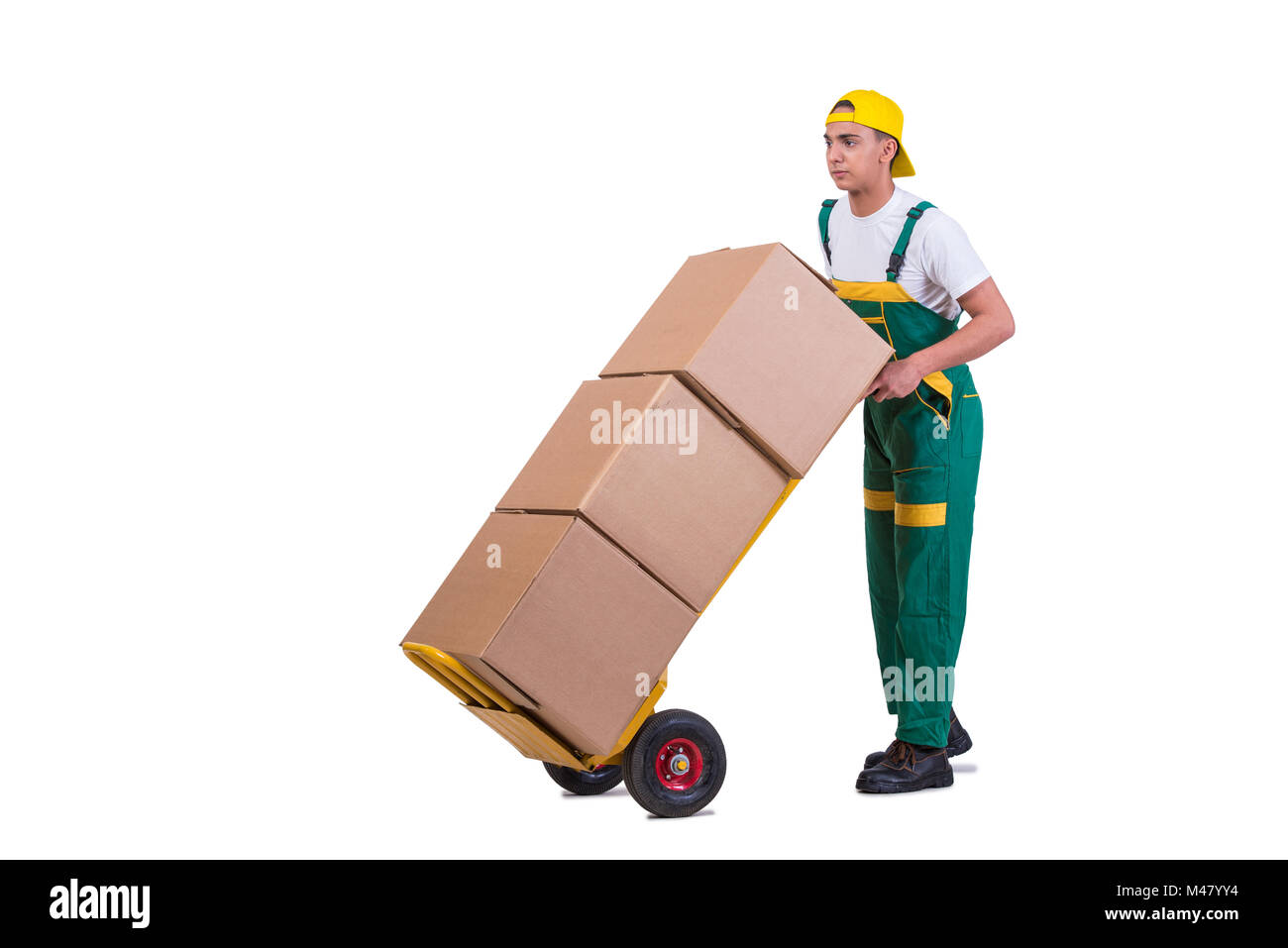 Young man moving boxes with cart isolated on white Stock Photo - Alamy