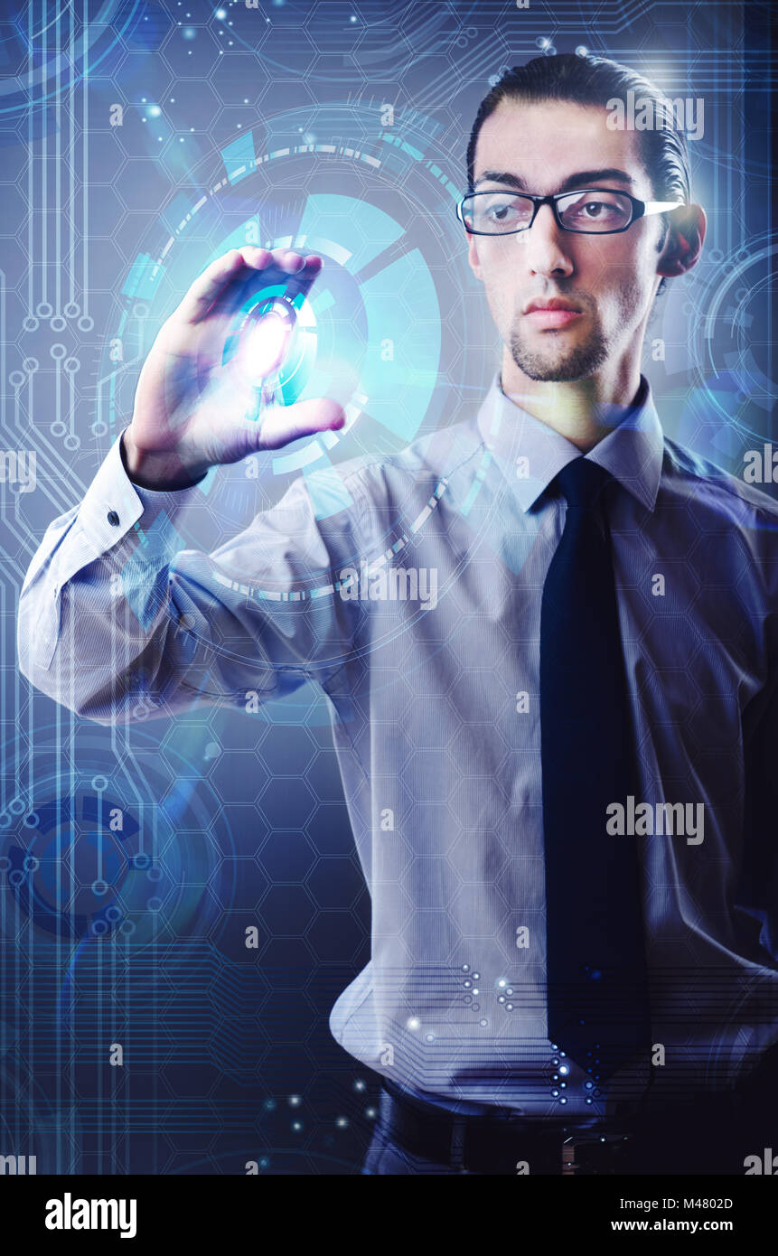 Businessman pressing virtual button in futuristic concept Stock Photo ...