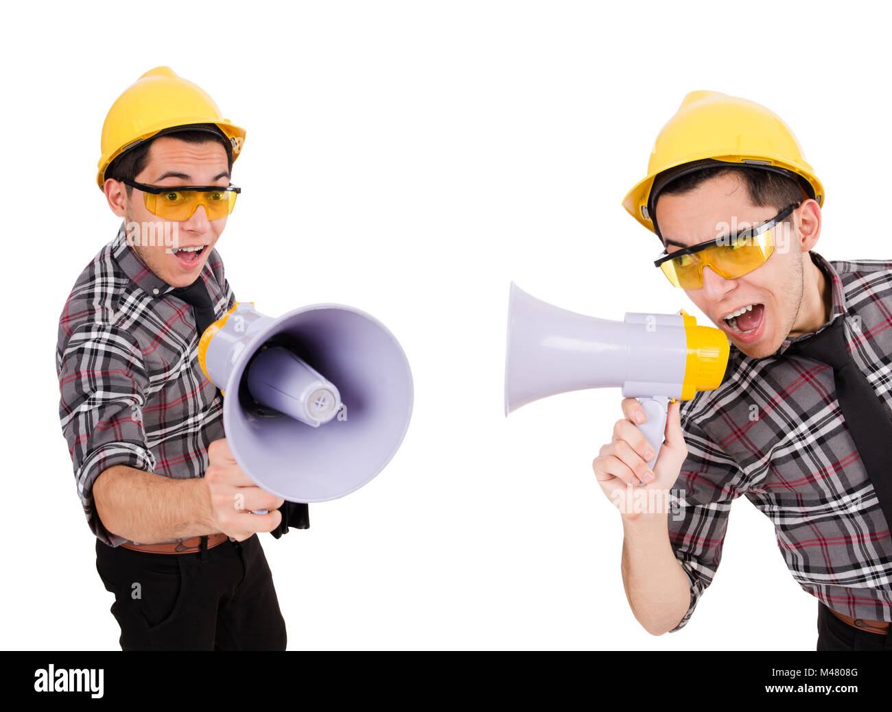 Young construction worker with loudspeaker isolated on white Stock ...