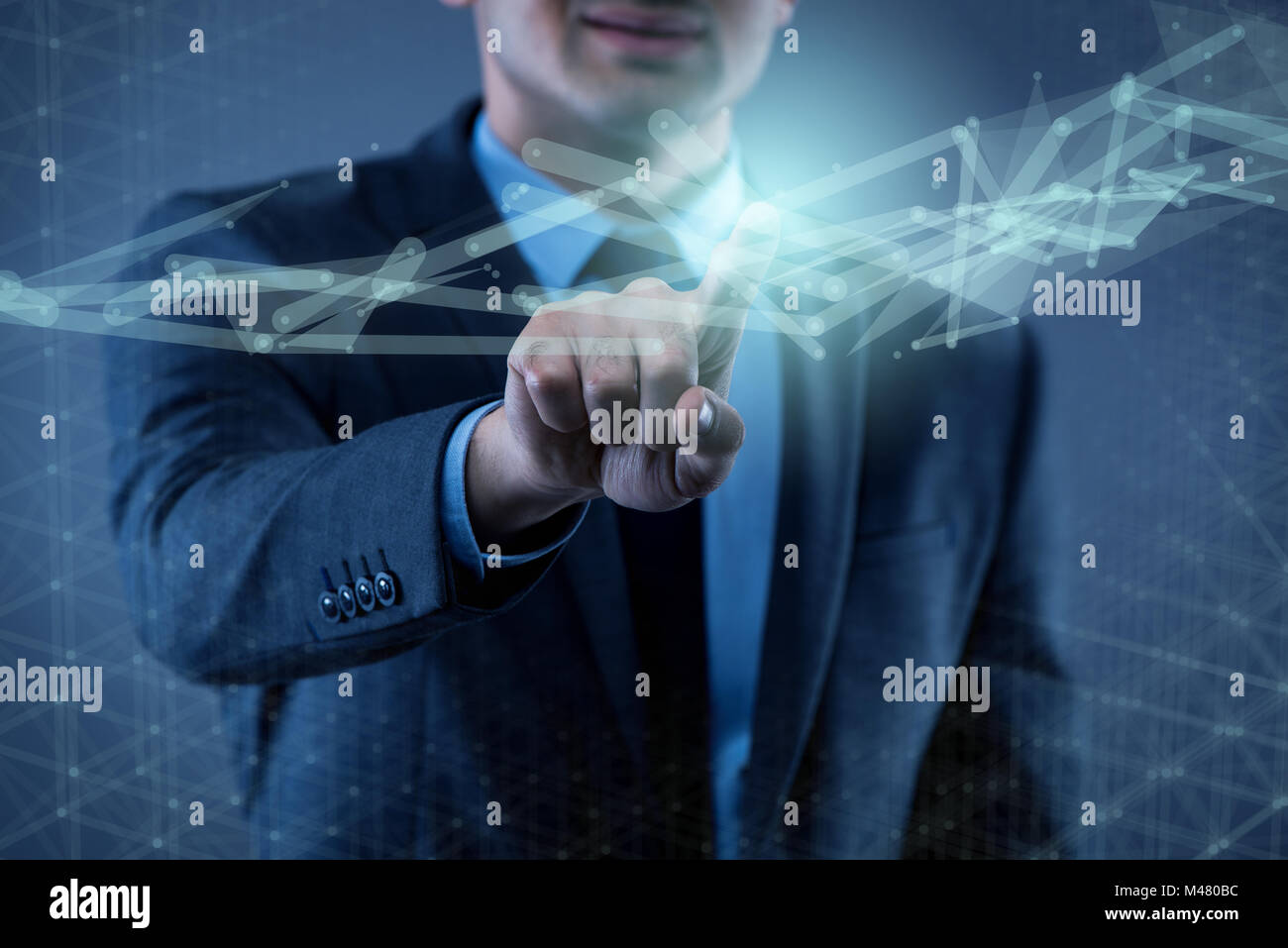 Businessman pressing virtual button in futuristic concept Stock Photo ...