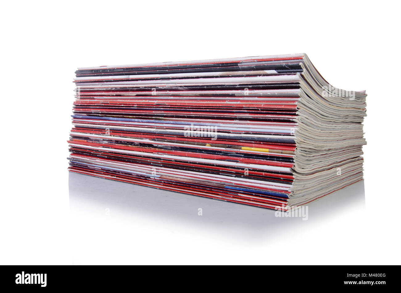 Stack of magazine isolated on the white background Stock Photo - Alamy
