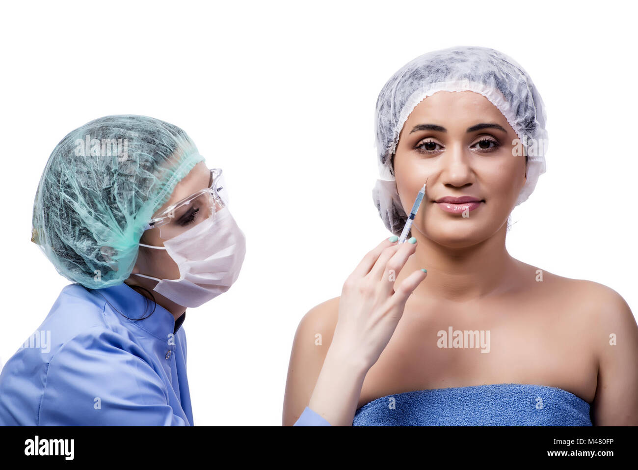 Young woman preparing for plastic surgery isolated on white Stock Photo ...