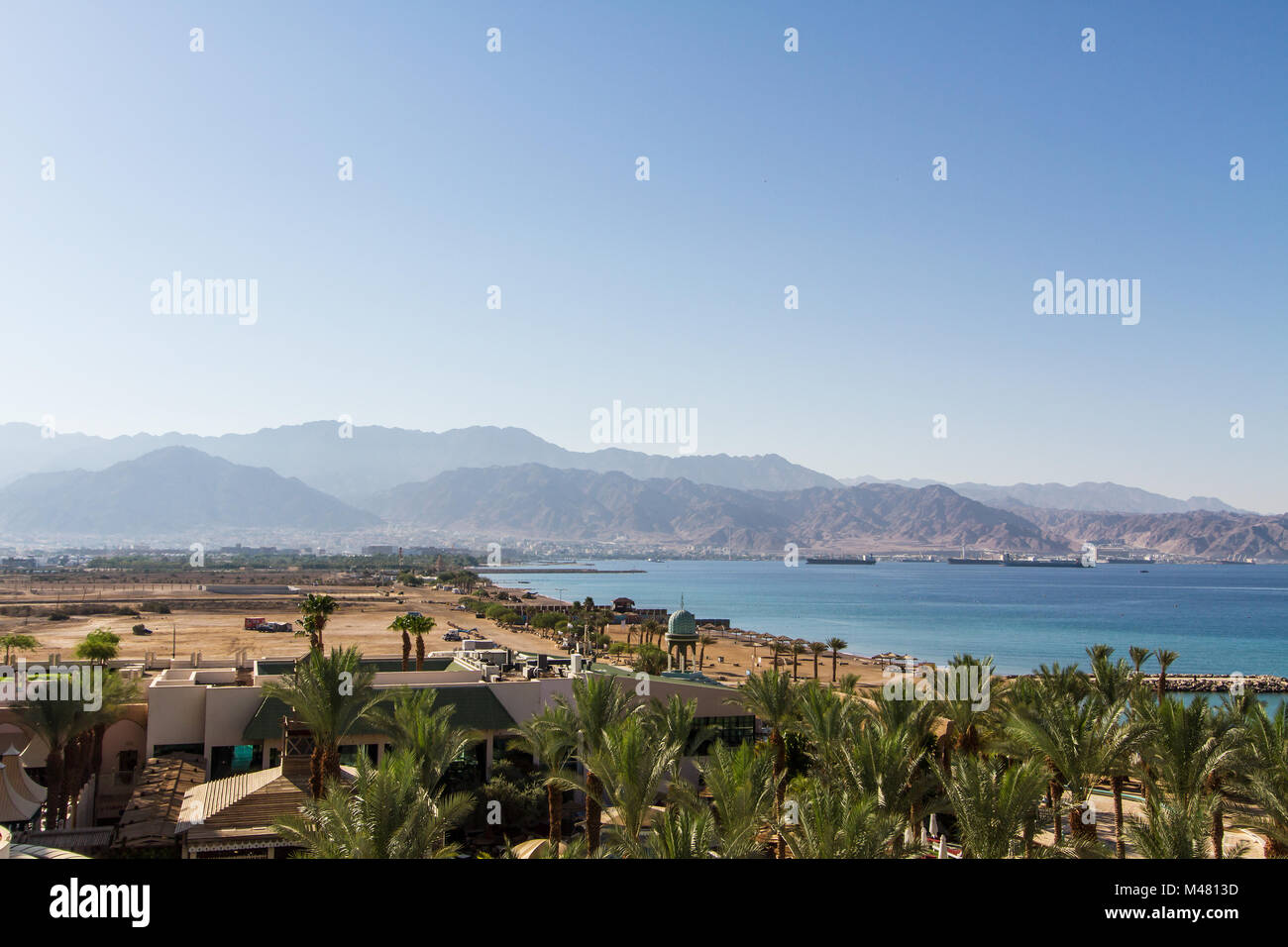 Panoramic view on Aqaba from central beach of Eilat Stock Photo - Alamy