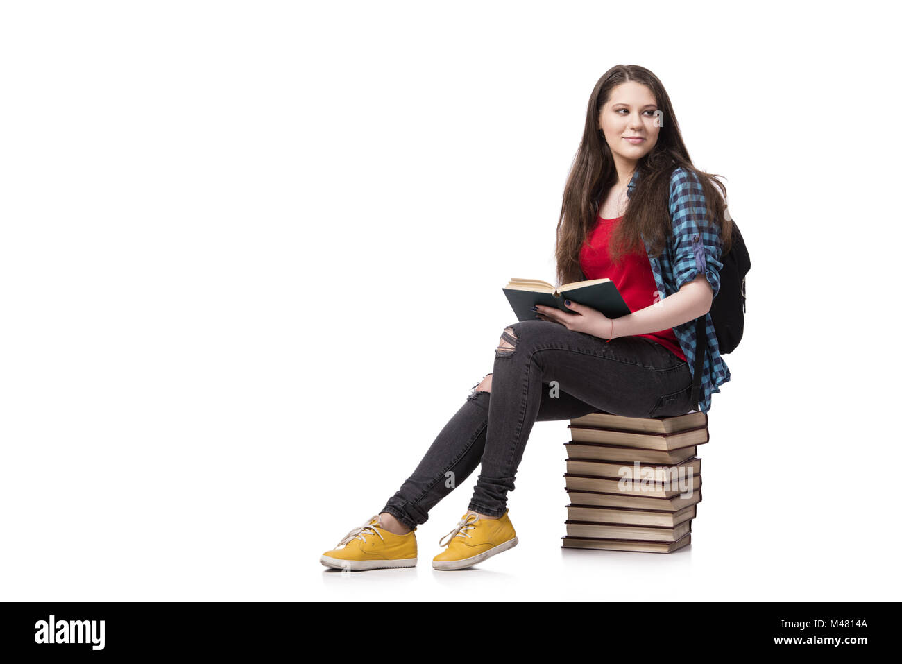Student with many books isolated on the white Stock Photo - Alamy