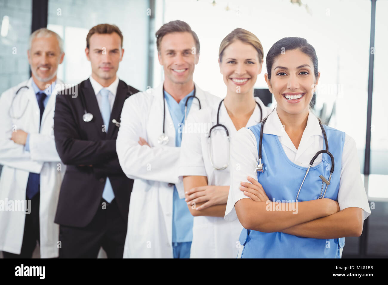 Happy medical team arms crossed hi-res stock photography and images - Alamy