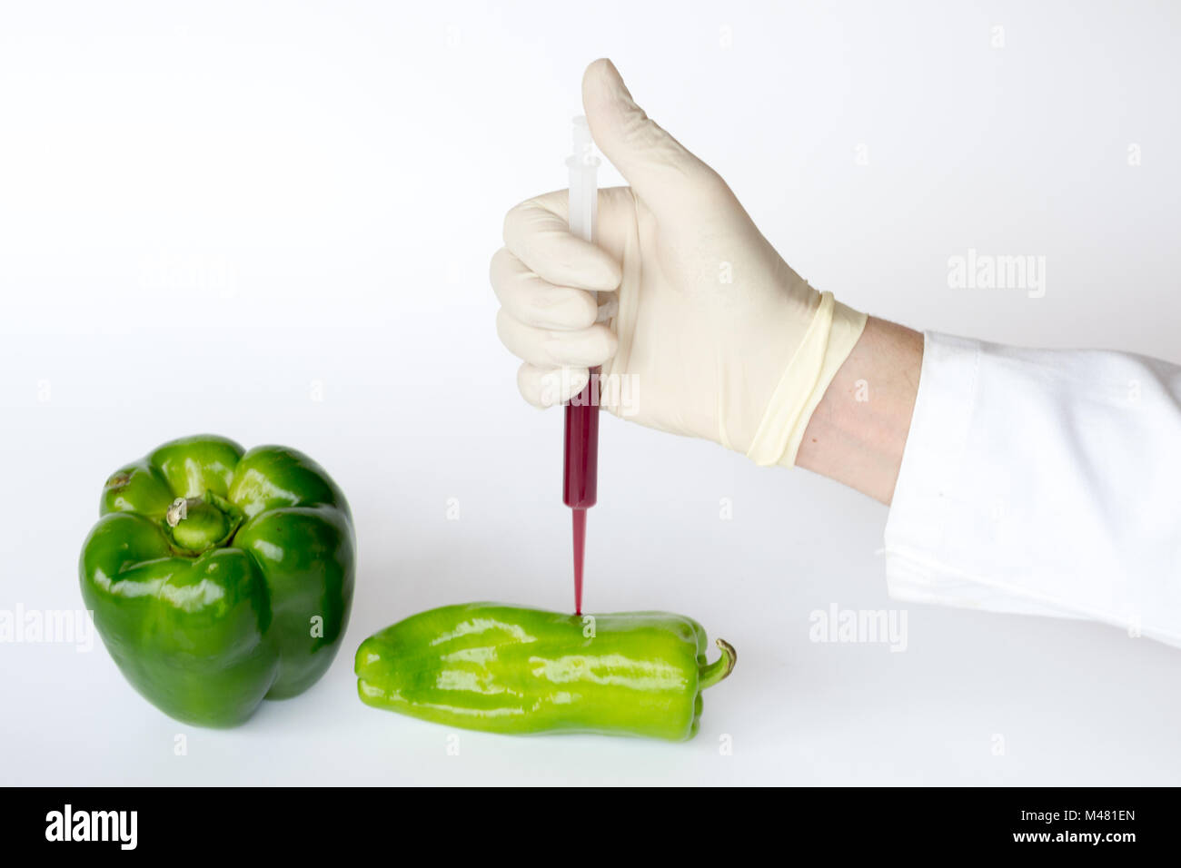 Injection to improve peppers Stock Photo - Alamy