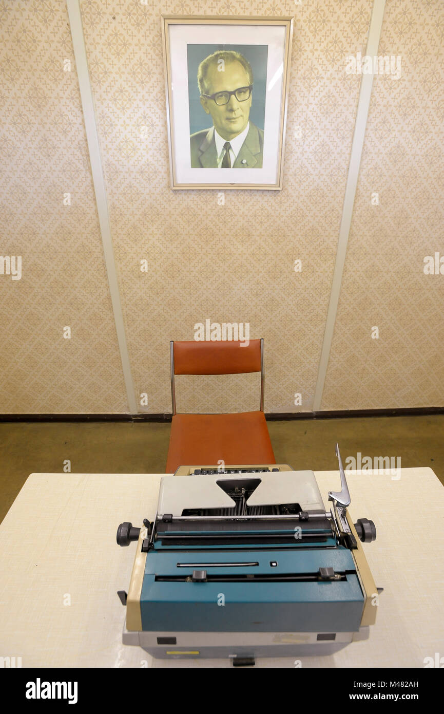 Exhibition of interrogation room with typewriter on the table and ...