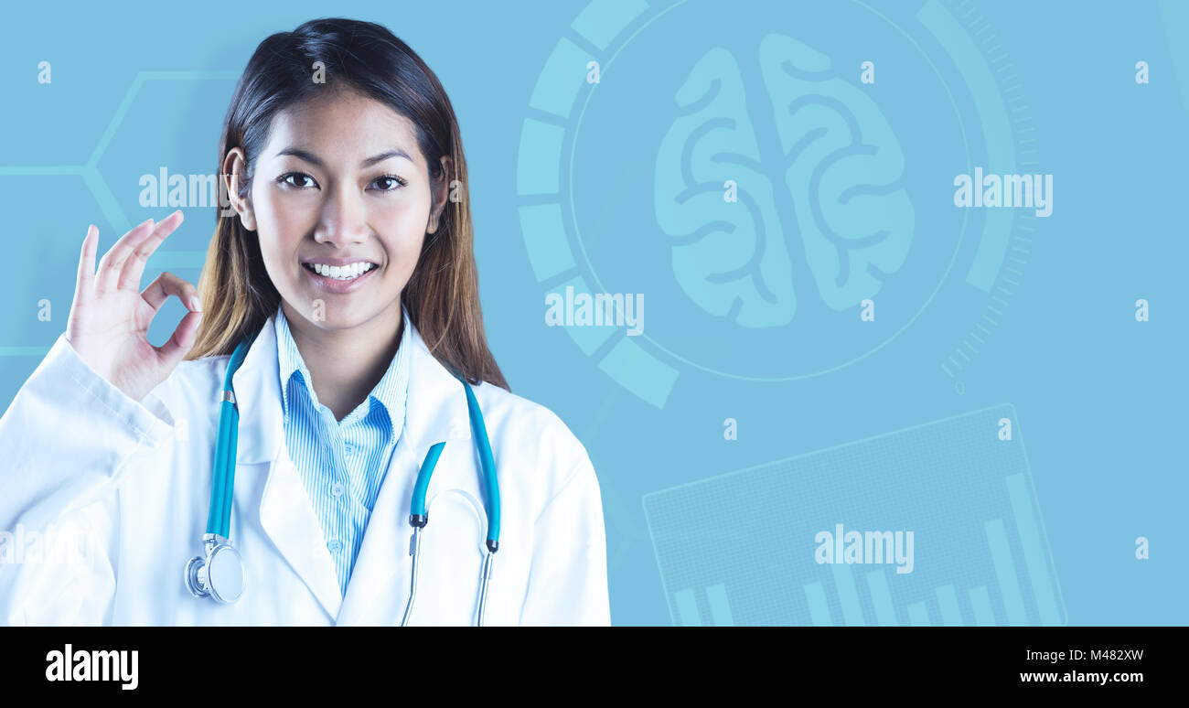 Composite image of asian doctor doing ok sign Stock Photo - Alamy