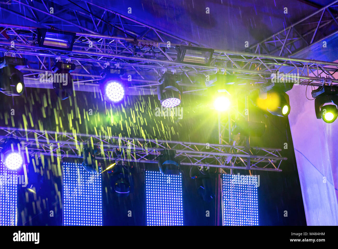 colorful stage light with raindrops at night Stock Photo - Alamy