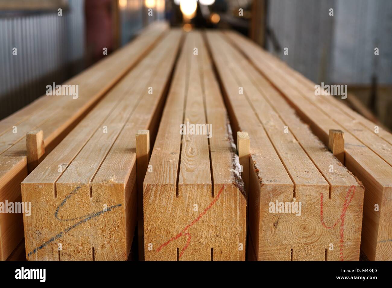 Image of wooden beams with cuts and color marks Stock Photo - Alamy