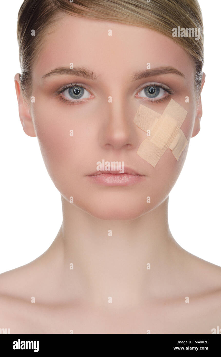 Young woman with medical plaster on her face Stock Photo - Alamy