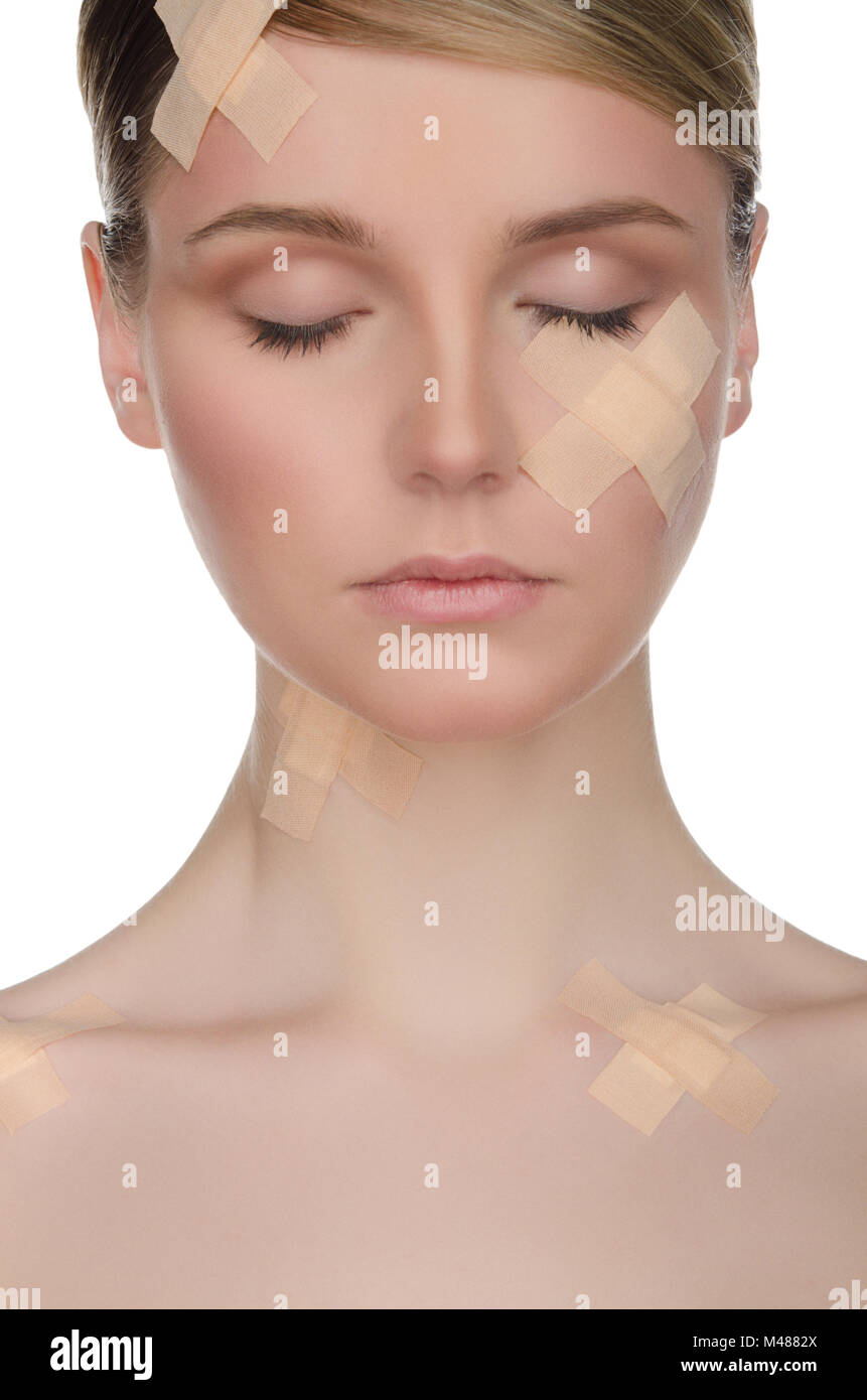 European woman with medical plaster on her face Stock Photo - Alamy