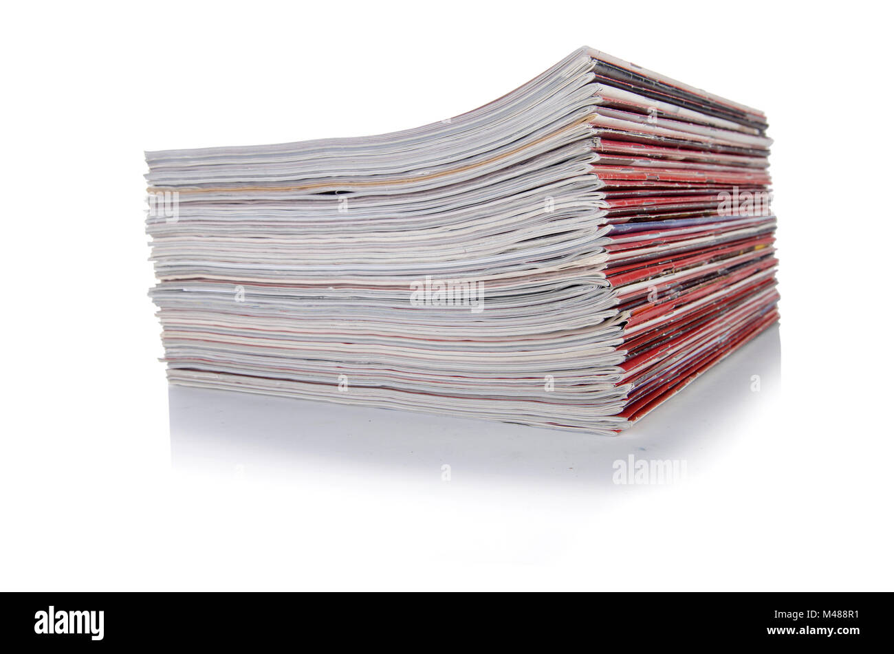 Stack of magazine isolated on the white background Stock Photo - Alamy
