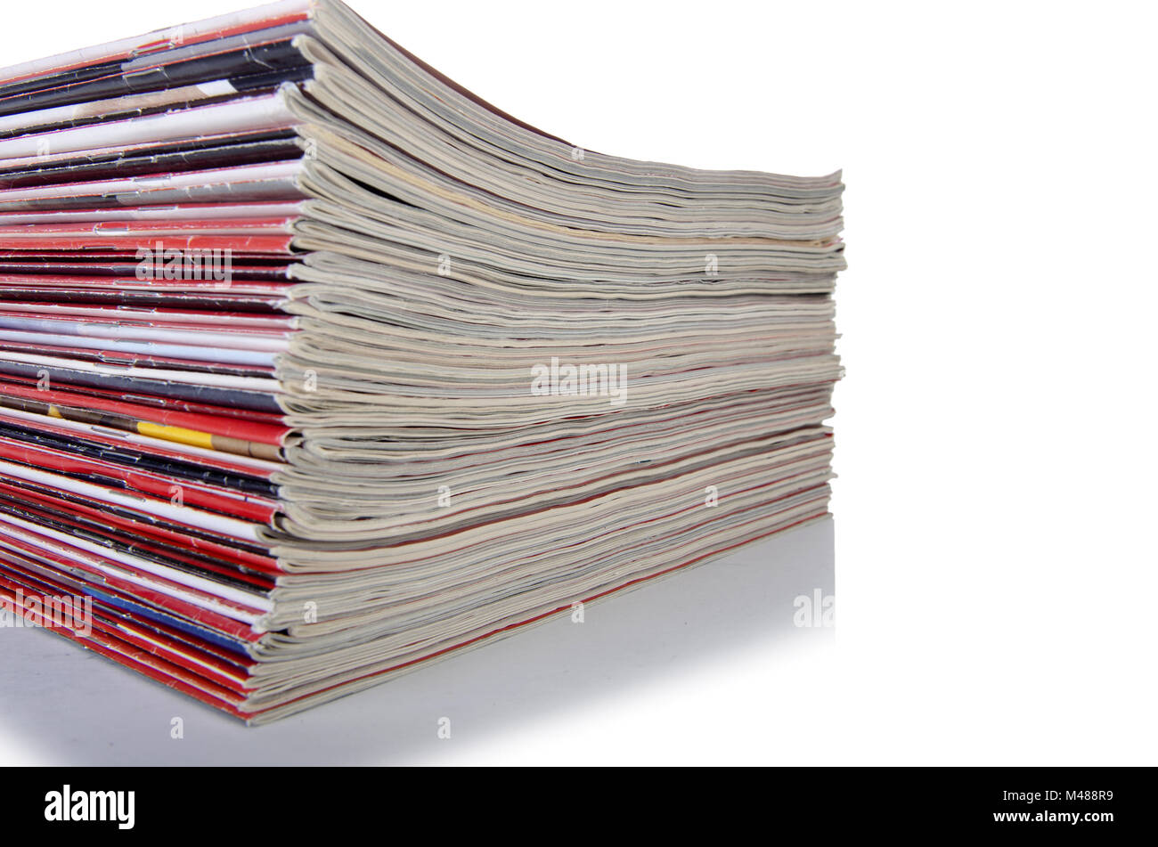 Stack of magazine isolated on the white background Stock Photo - Alamy
