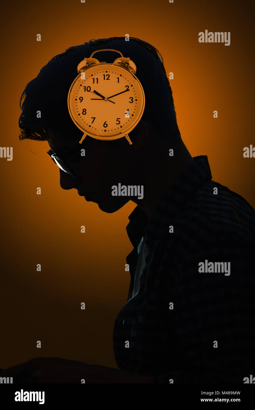 Concept of missing deadlines with man and clock Stock Photo - Alamy