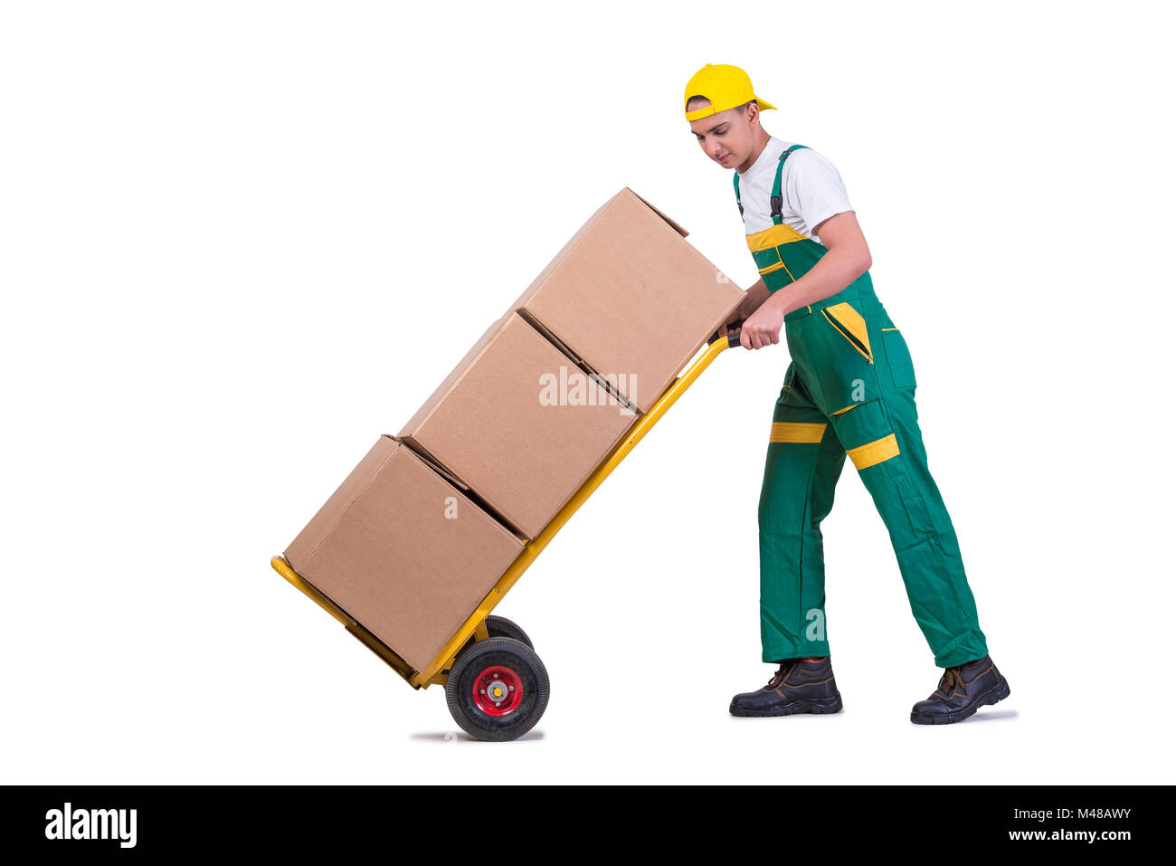 Young man moving boxes with cart isolated on white Stock Photo - Alamy