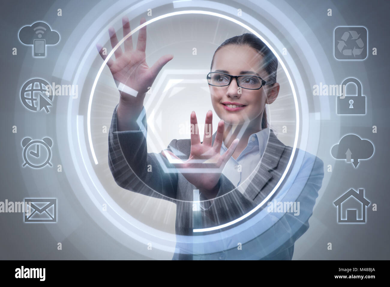 Businesswoman pressing virtual buttons in futuristic concept Stock ...