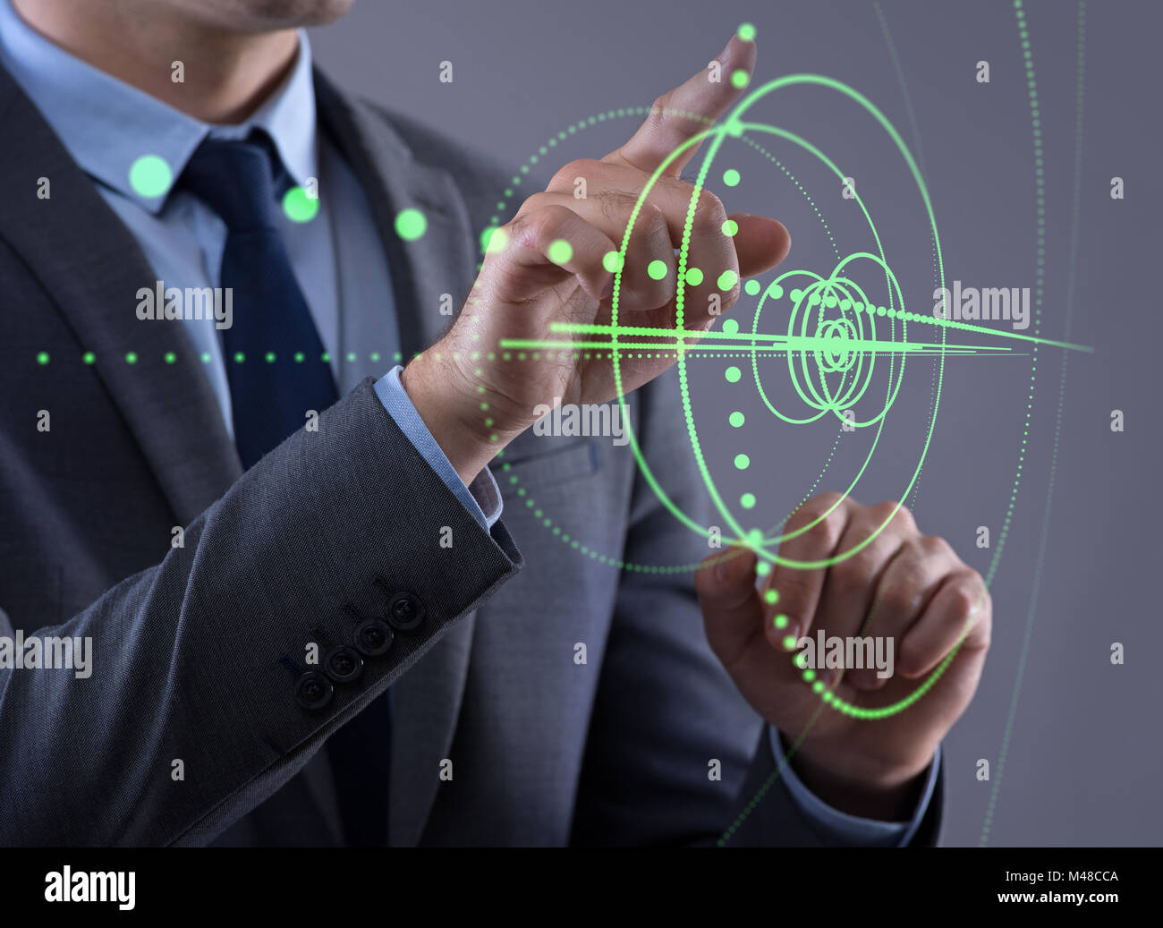 Businessman pressing virtual buttons in futuristic concept Stock Photo ...