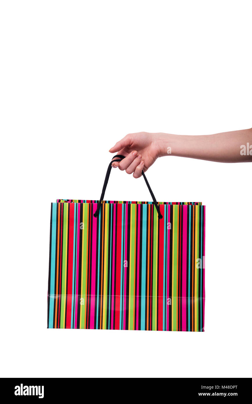 Hand holding giftbag isolated on white Stock Photo - Alamy