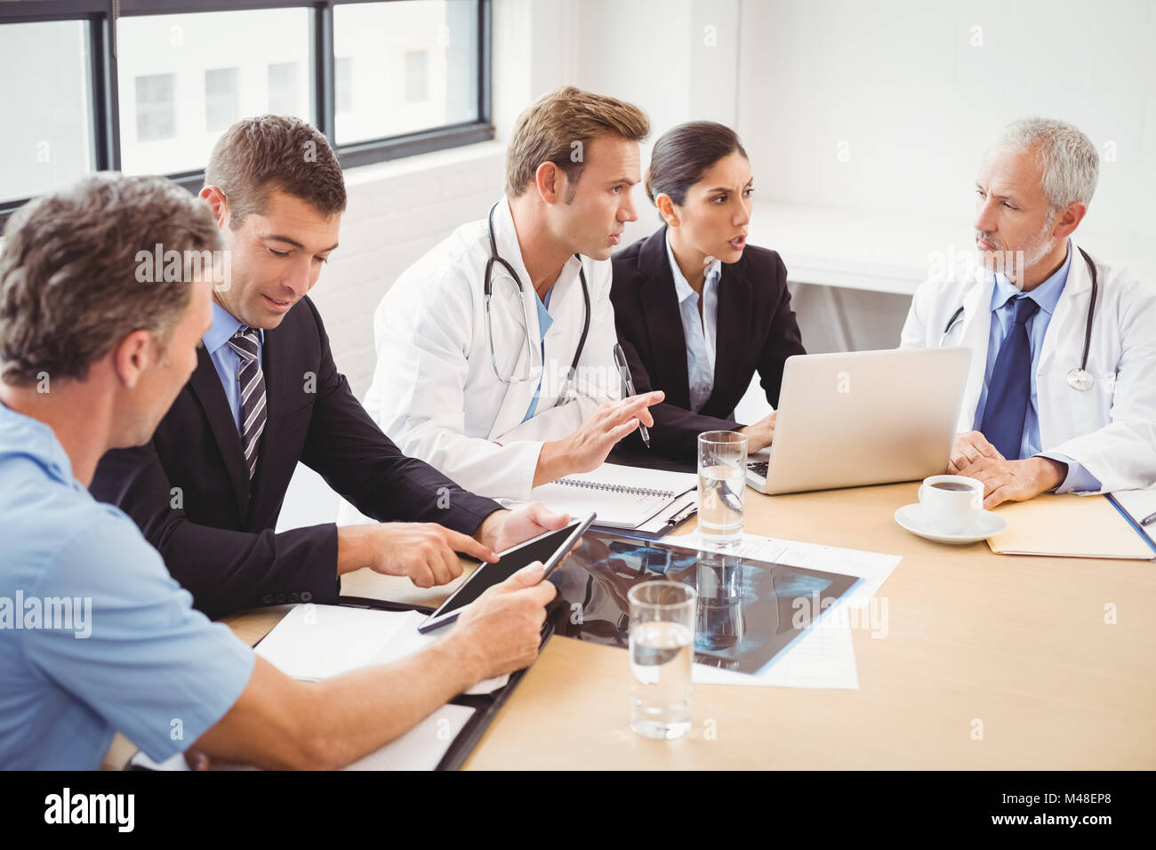 Medical team having a meeting in conference room Stock Photo - Alamy