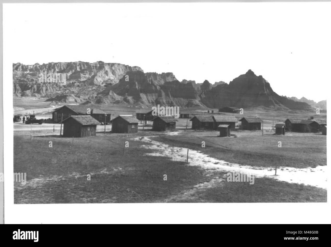 Badlands National Park, black and white historical photograph. Cabins ...