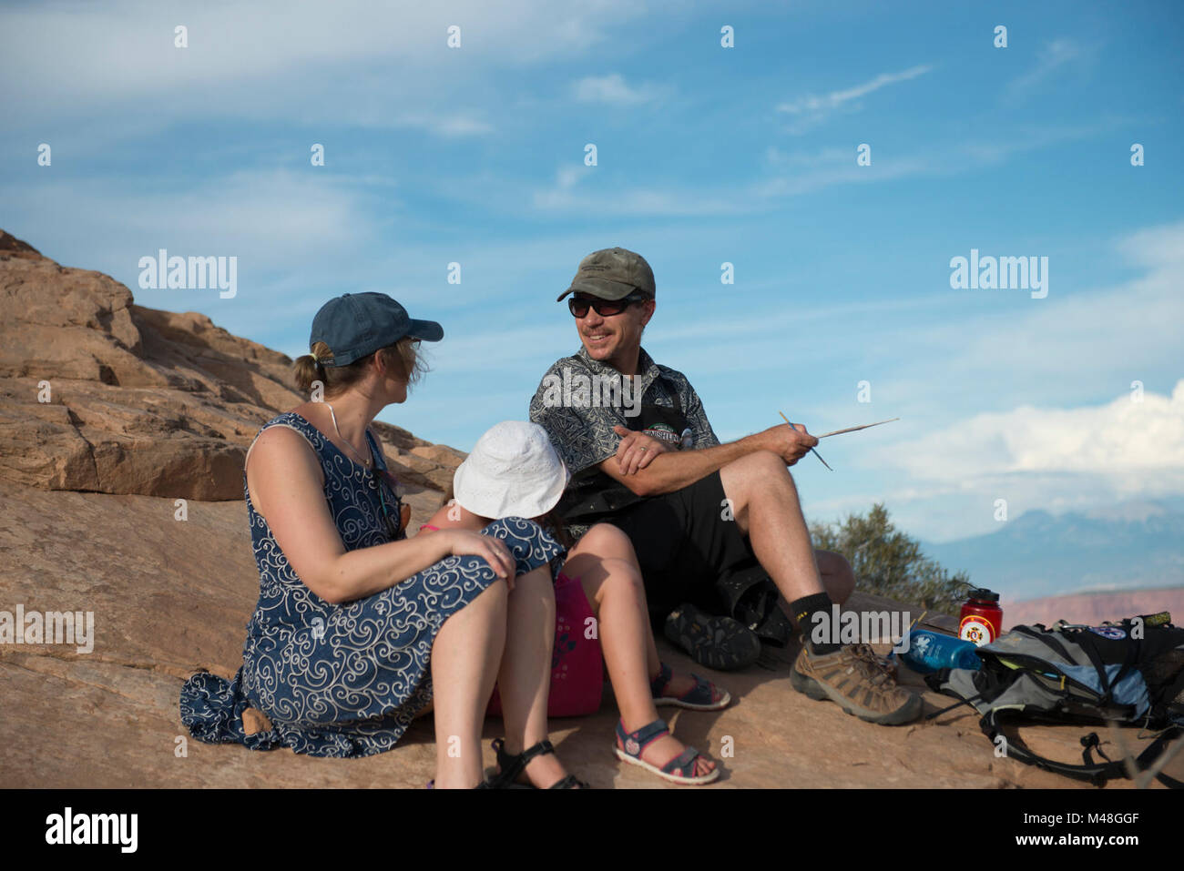 Community Artist Anthony Lott paints at Mesa Arch Stock Photo - Alamy