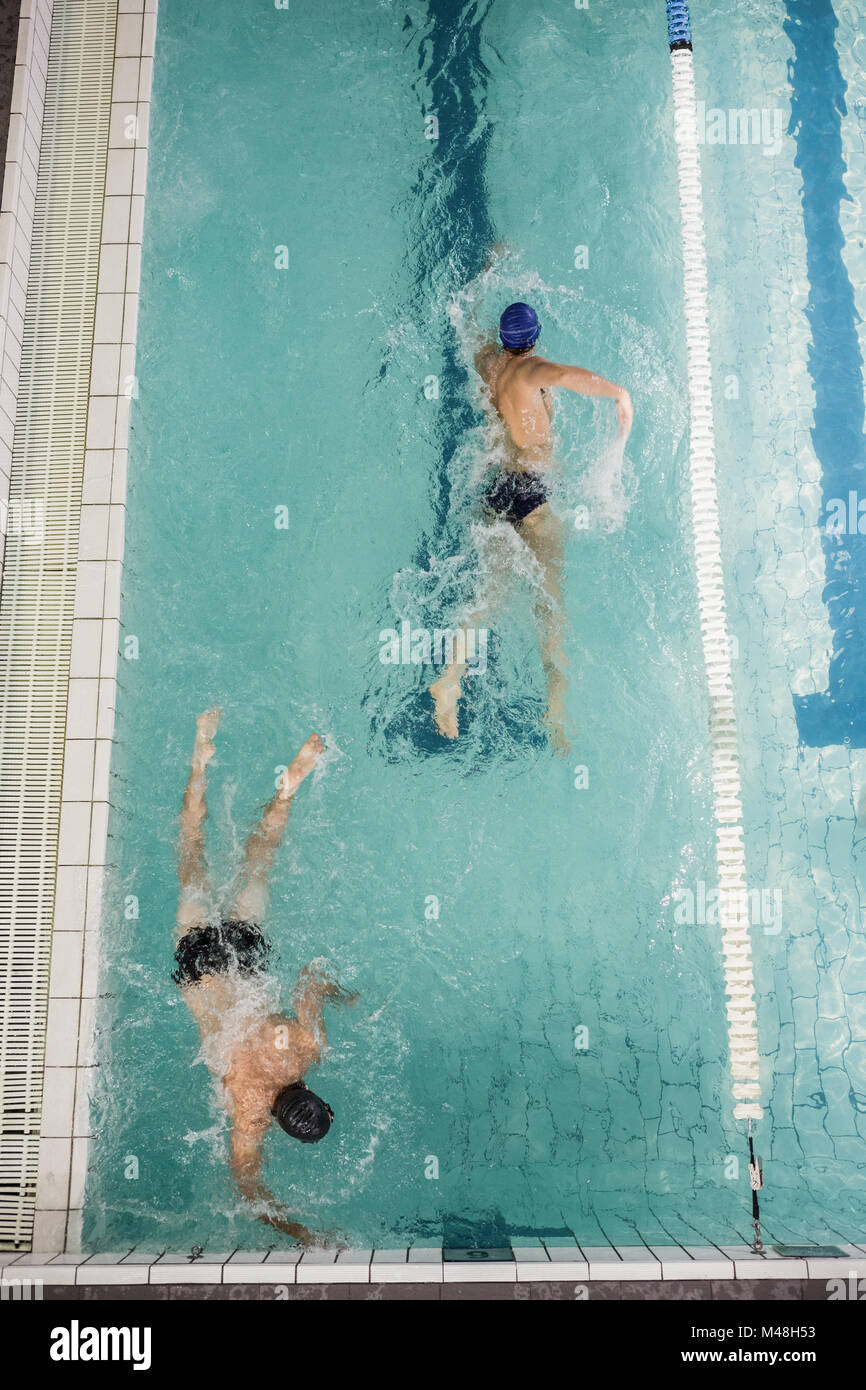 Swimmers doing the freestyle stroke in swimming pool Stock Photo - Alamy