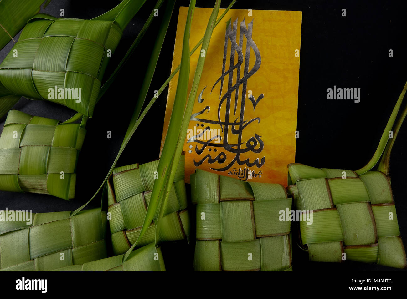 Rice dumpling and money packet decoration for Eid Mubarak celebration ...