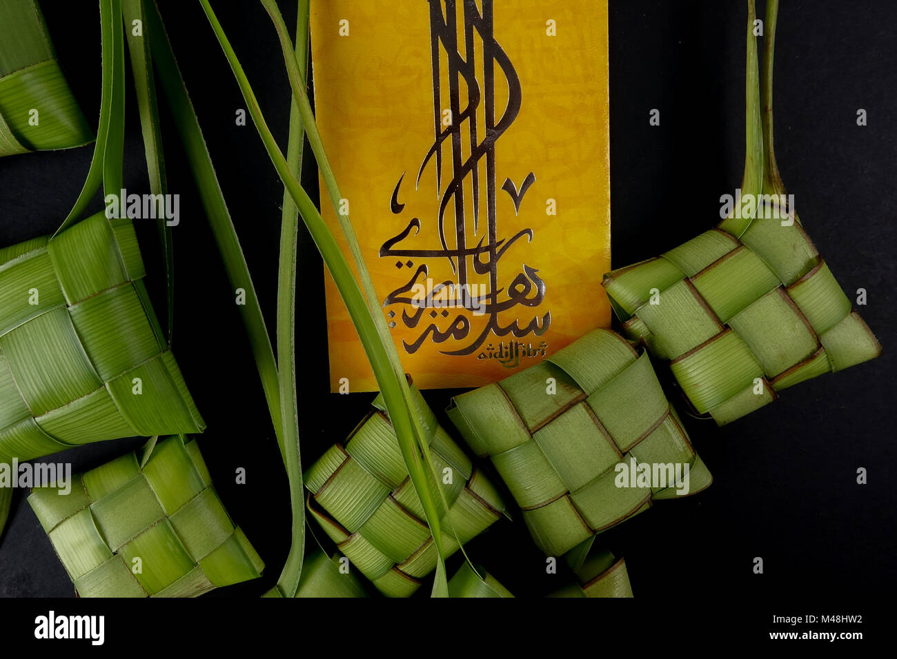 Rice dumpling and money packet decoration for Eid Mubarak celebration ...