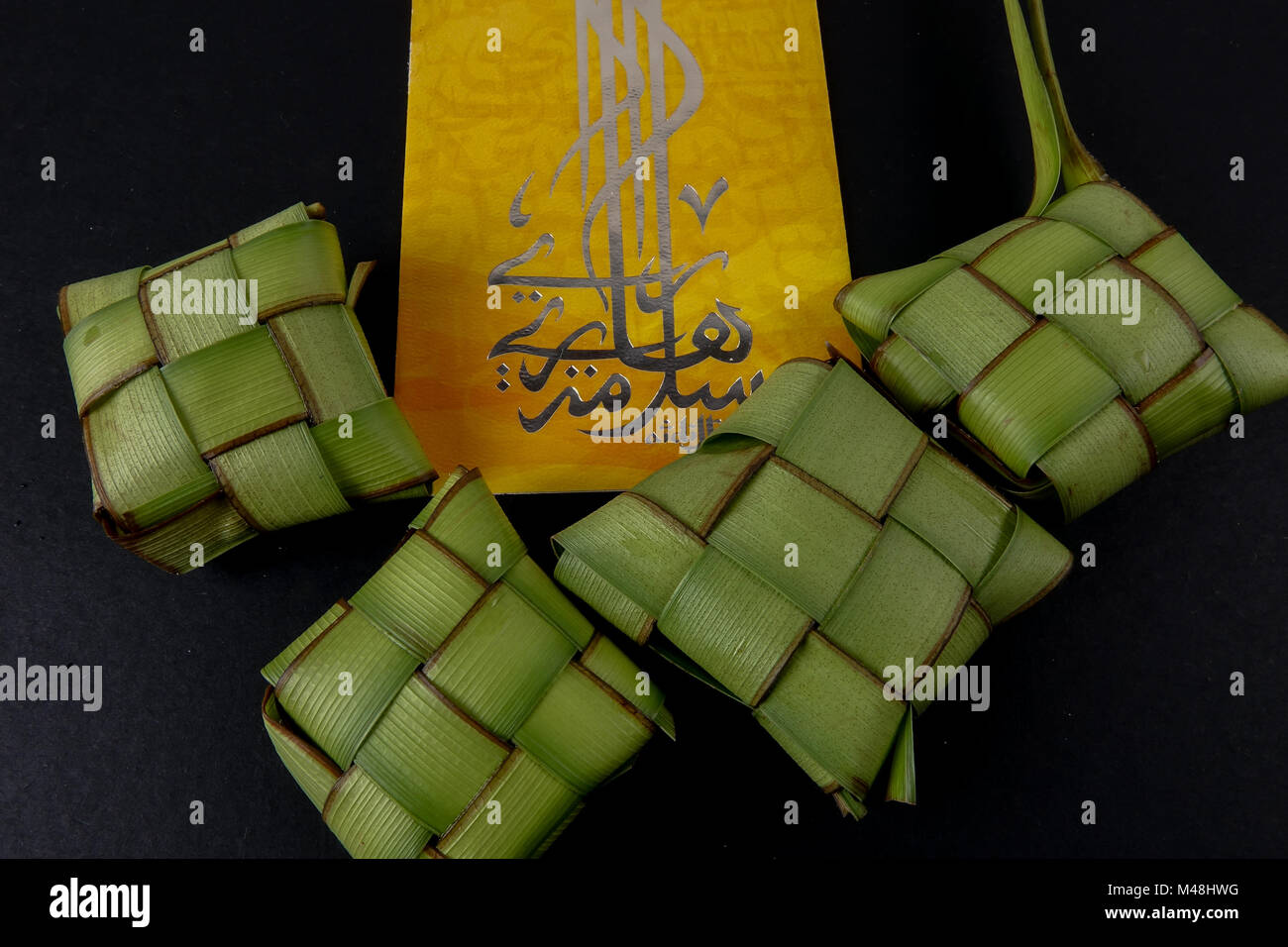 Rice dumpling and money packet decoration for Eid Mubarak celebration ...
