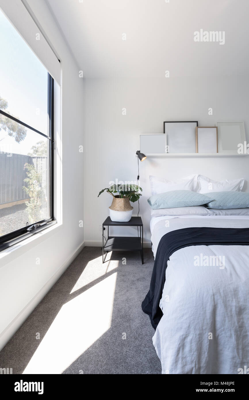 Beautiful sunlight beaming into a luxuriously styled bedroom Stock ...