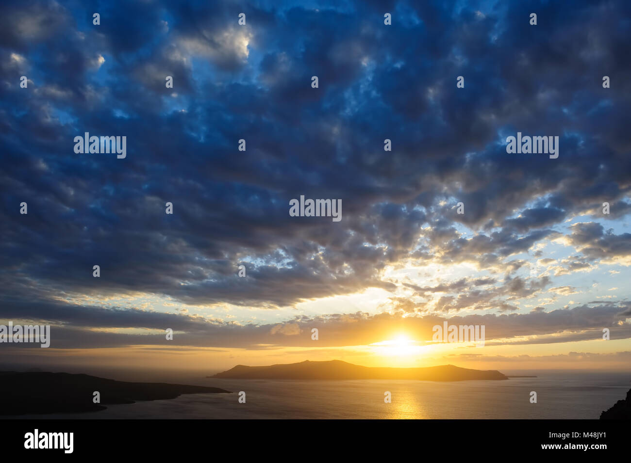 Beautiful sunset at the beach of santorini hi-res stock photography and ...