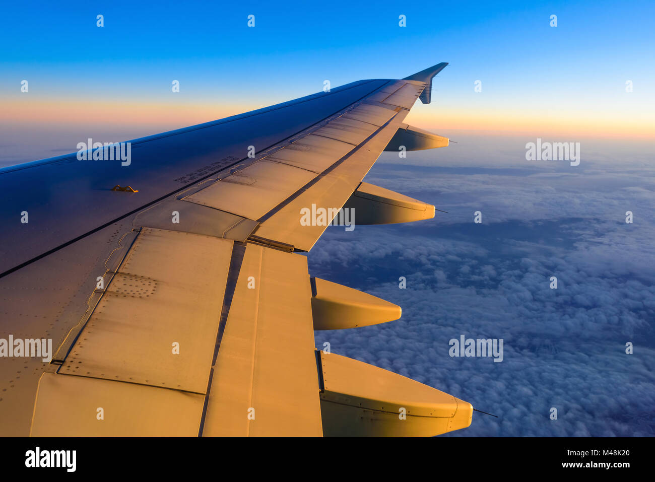 view of the wing of an airplane through the window Stock Photo - Alamy