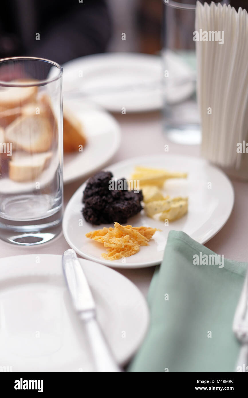 Appetizers and bread platter Stock Photo - Alamy