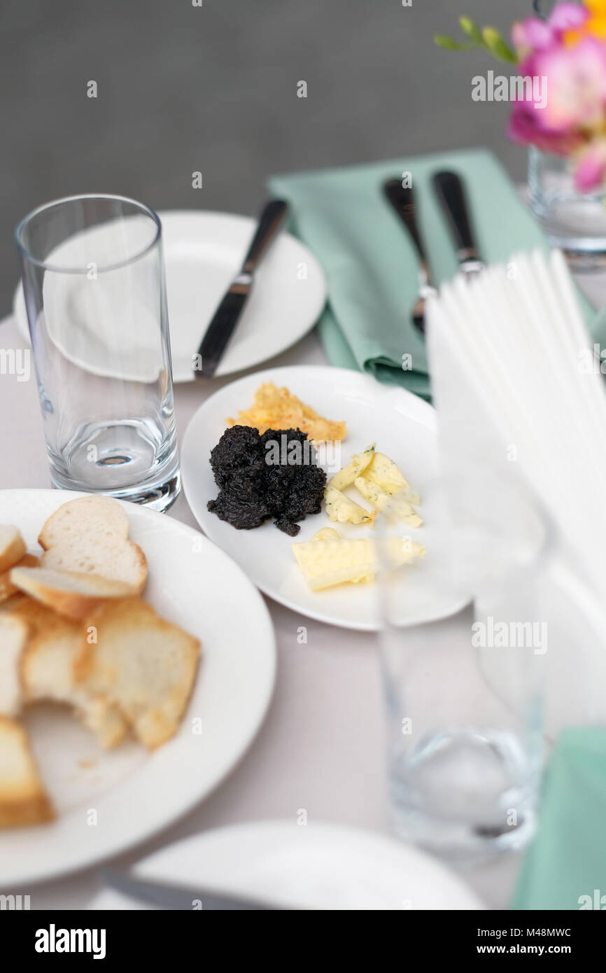 Appetizers and bread platter Stock Photo - Alamy